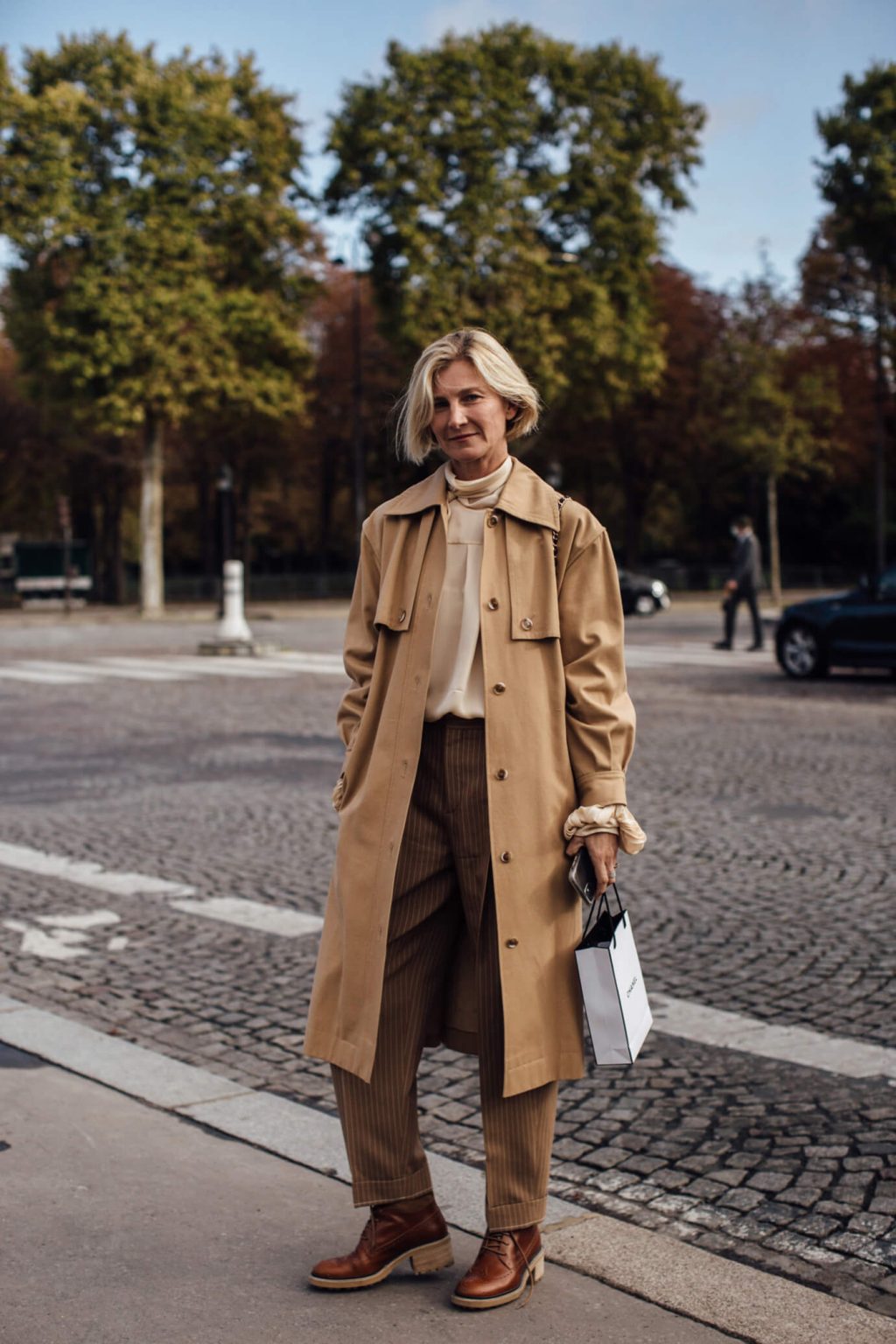 How French Women Look Effortlessly Stylish in a Trench Coat